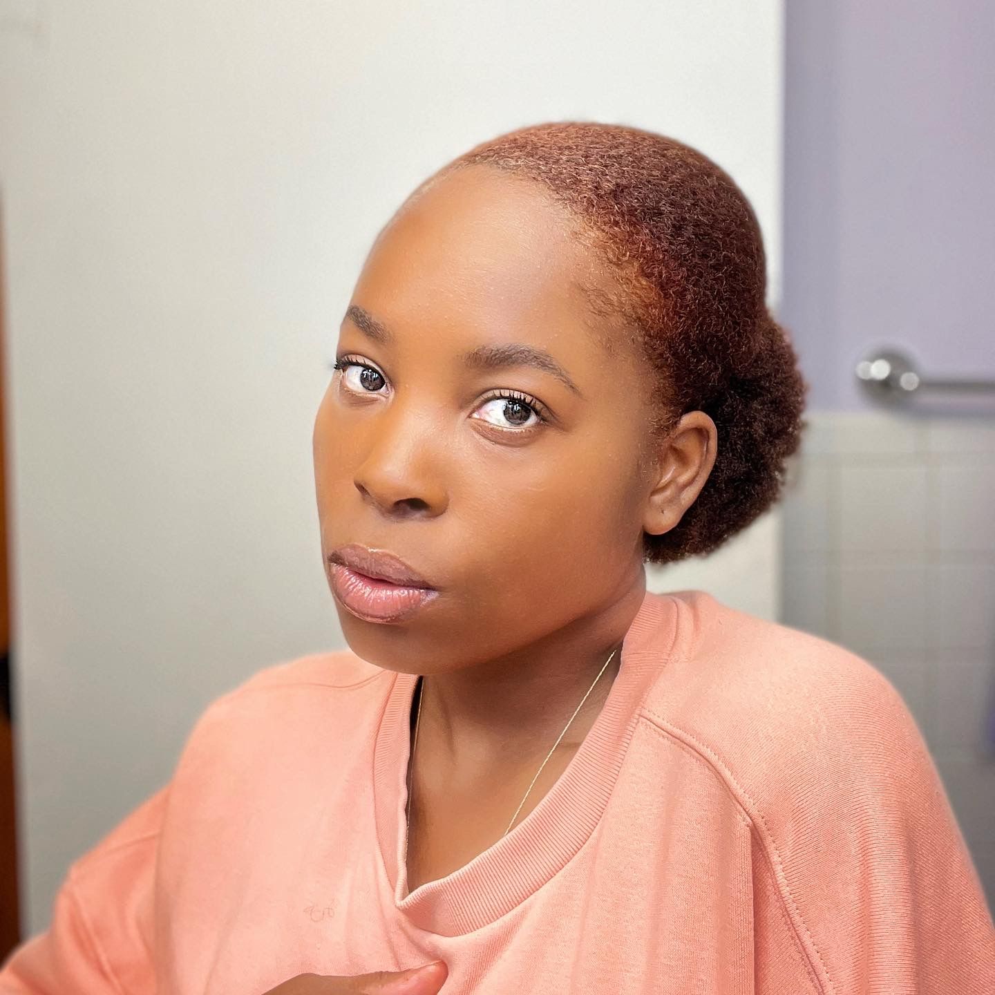 Achieving the Perfect Two Braids on One Side with a Low Puff